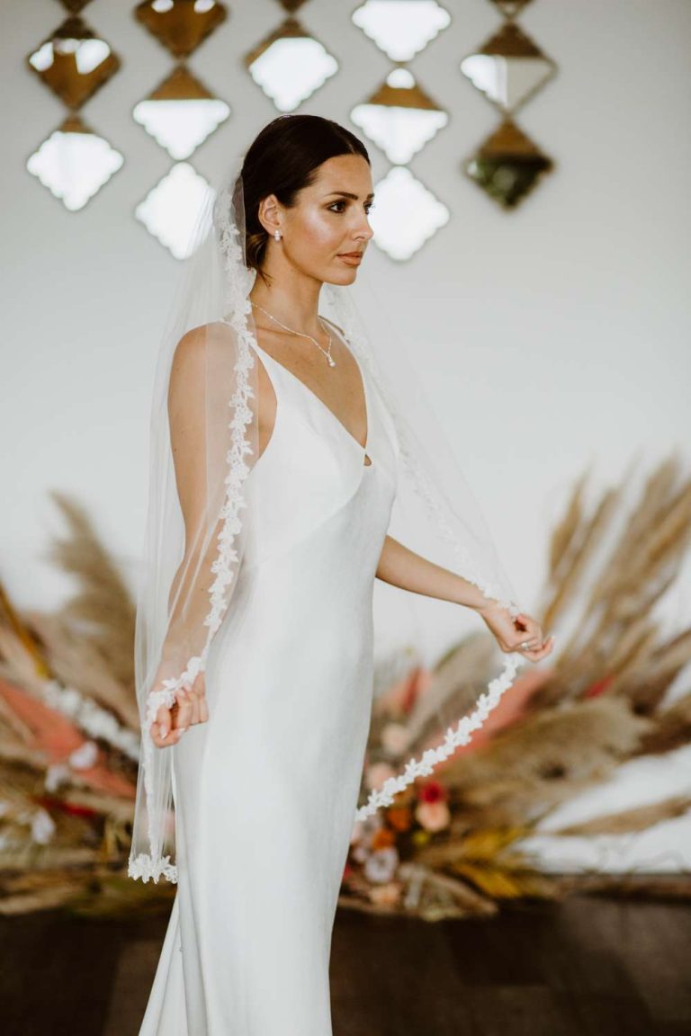 Zoe | Single Layer Fingertip Length Lace Trim Wedding Veil