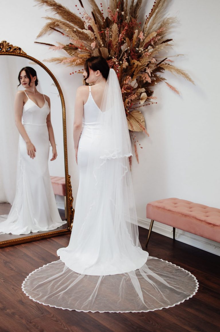 Lacey - two layer chapel length veil with a narrow lace edge